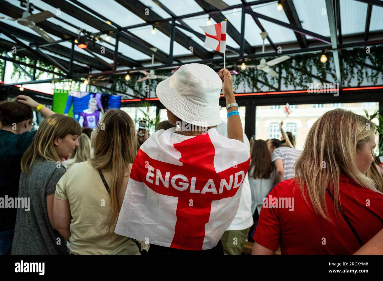 London, UK. 12 August 2023. England fans at BOXPARK in Shoreditch ...