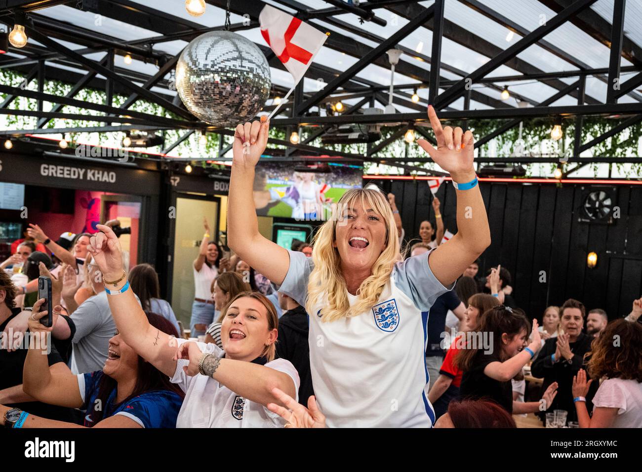 London, UK. 12 August 2023. England fans at BOXPARK in Shoreditch ...