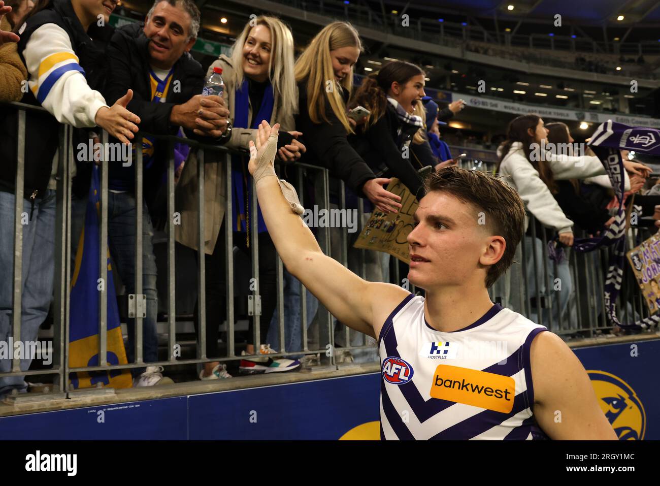 Perth, Australia. 12th Aug, 2023. Caleb Serong of the Dockers greets ...