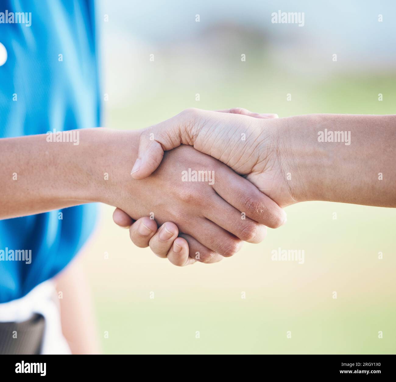People, handshake and sports in agreement, teamwork or partnership on ...