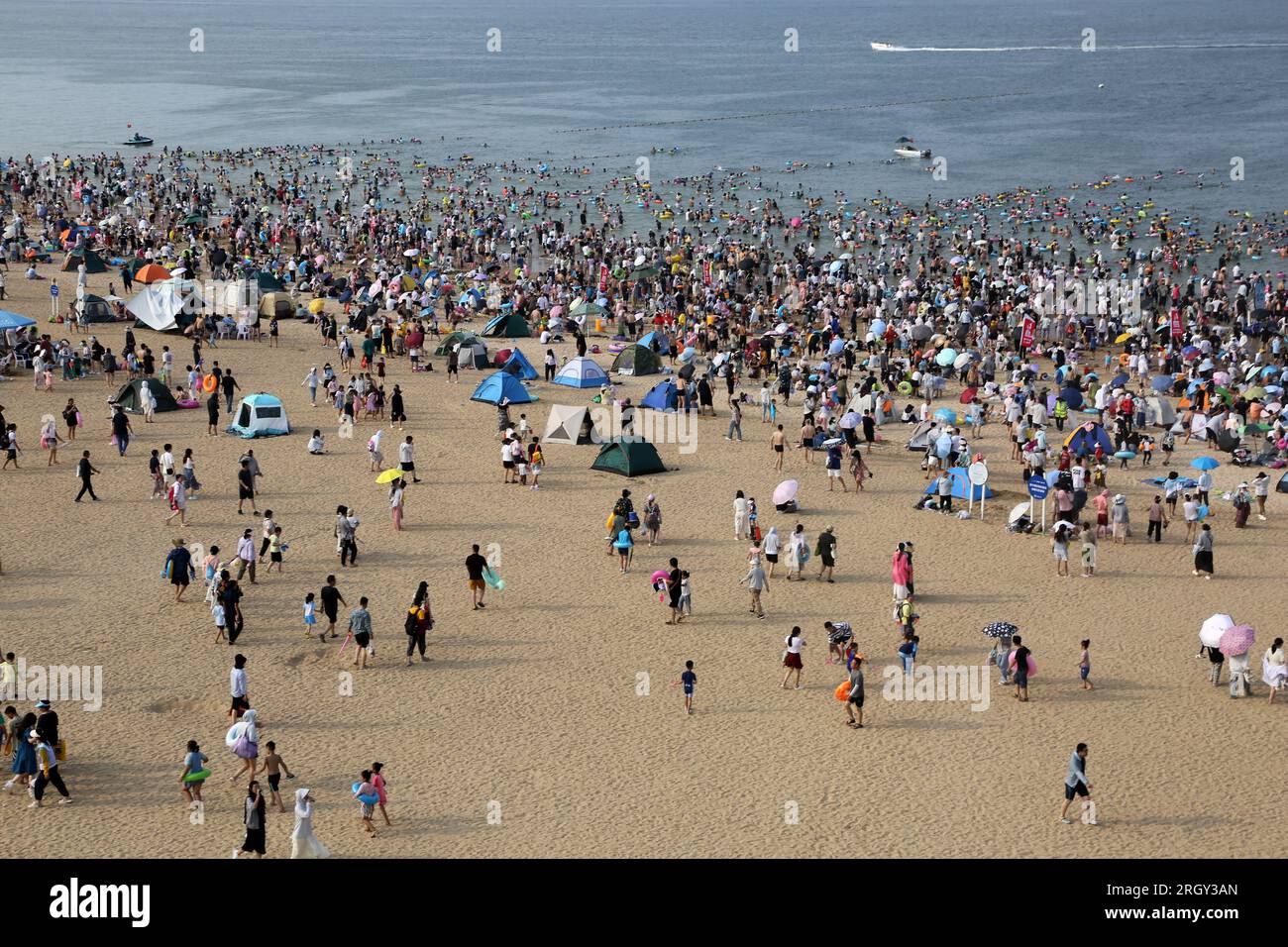 LIANYUNGANG, CHINA - AUGUST 12, 2023 - Tourists cool off at Dashawan ...