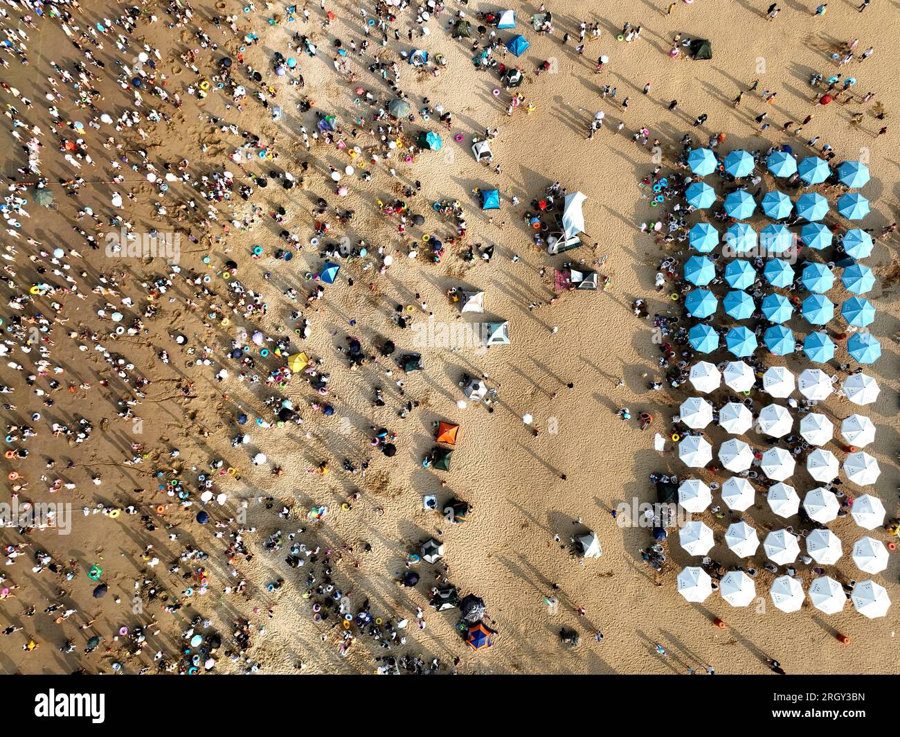 LIANYUNGANG, CHINA - AUGUST 12, 2023 - Tourists cool off at Dashawan ...