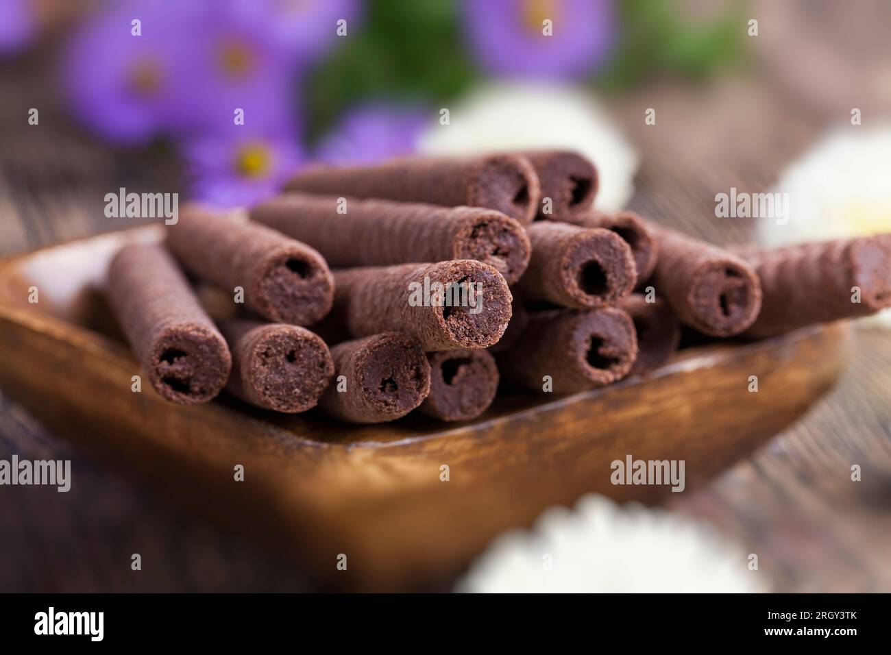 chocolate tubes with chocolate filling, dessert of chocolate waffle ...