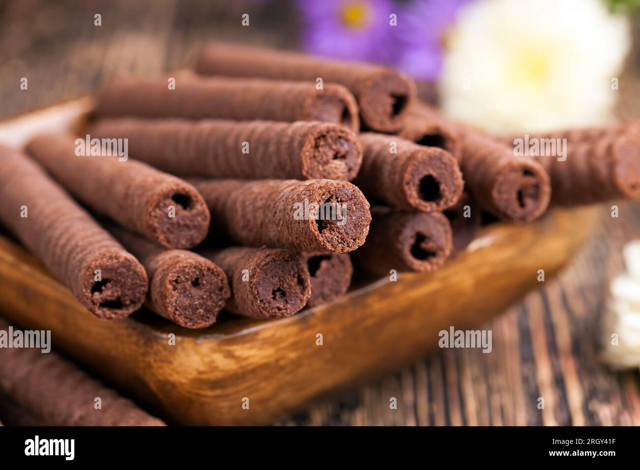 chocolate tubes with chocolate filling, dessert of chocolate waffle ...