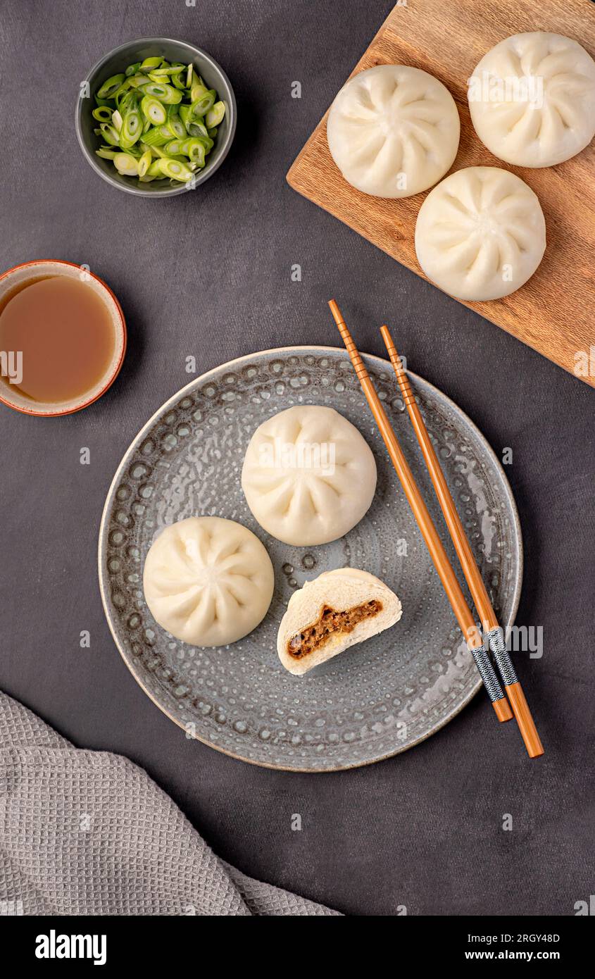 Food photography of steamed bun, bao, duck meat, spring onion, chinese ...