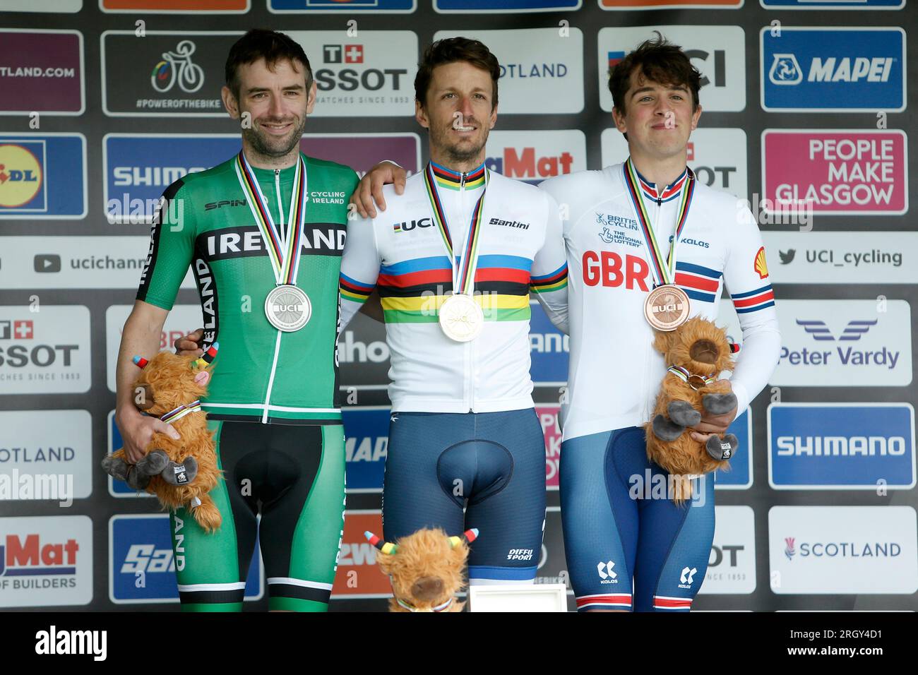 France's Kevin le Cunff (centre) poses with his medal after winning the ...