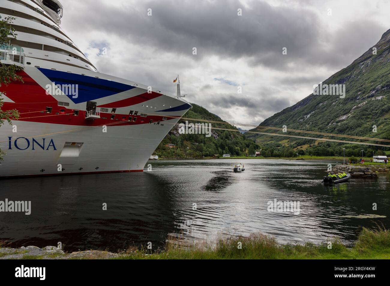 P&O Cruises ship Iona, docked in the Norwegian Fjord town of Hellesyt ...