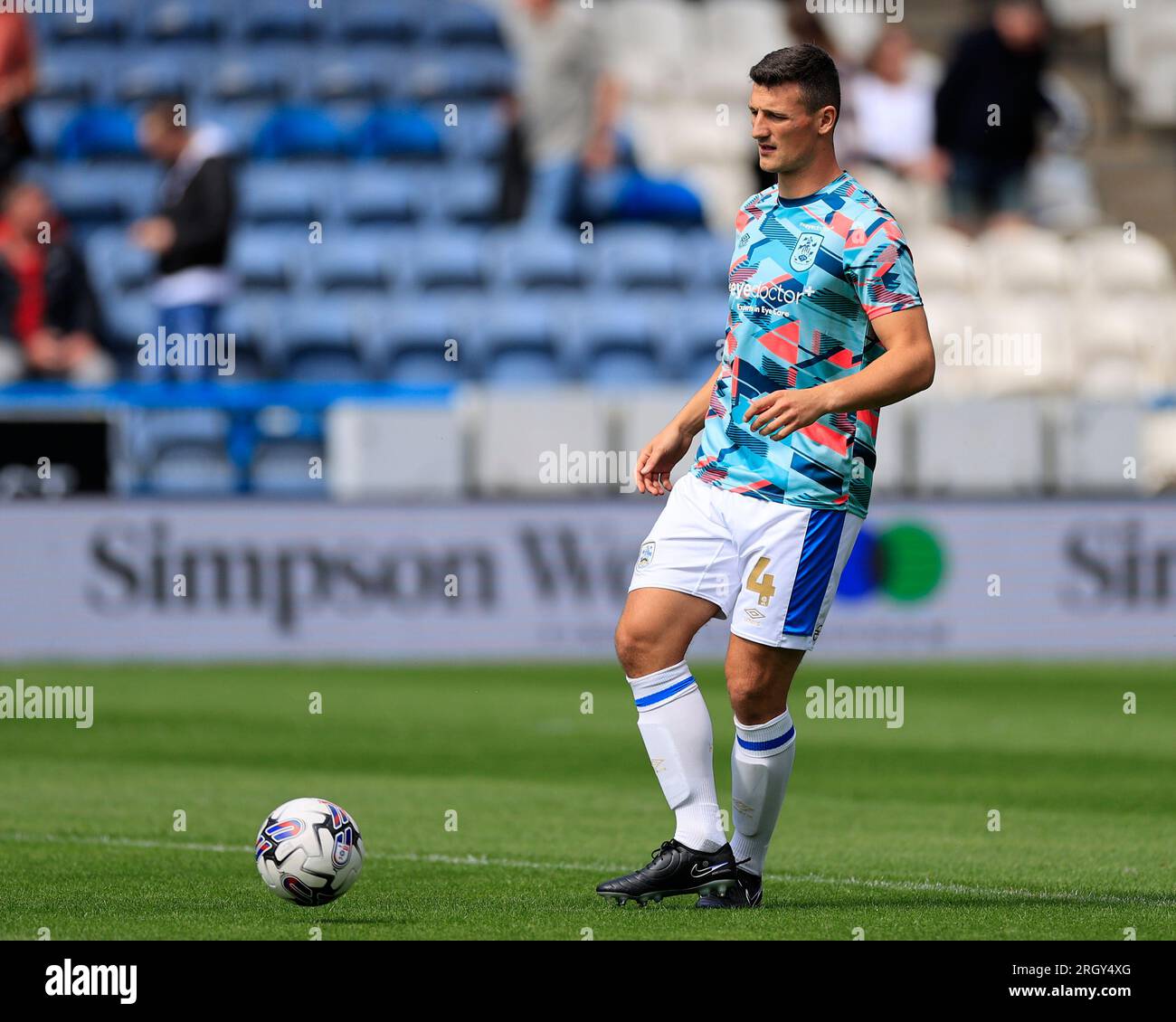 Matty Pearson #4 of Huddersfield Town during the warm up ahead of the ...