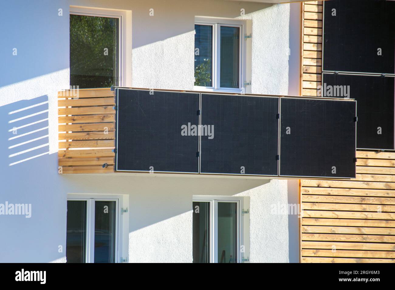 Balcony power plant: Solar panels on the balcony of a detached house ...
