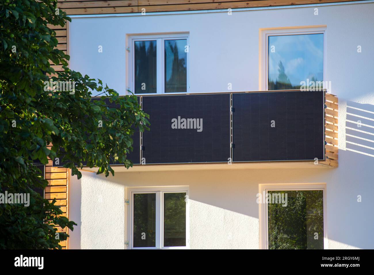 Balcony power plant: Solar panels on the balcony of a detached house ...