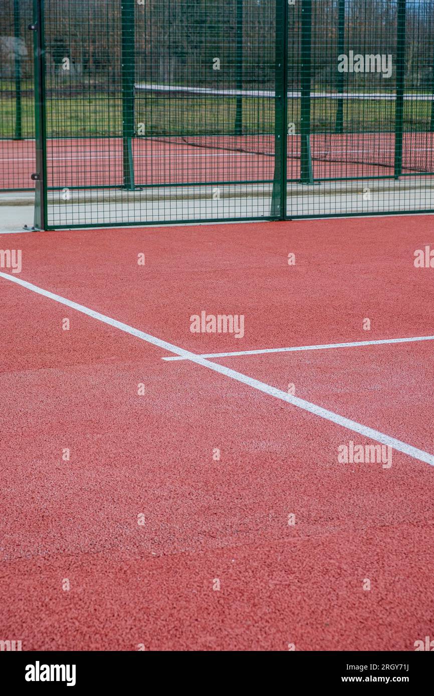 detail of the line of a red paddle tennis court, racket sports courts ...