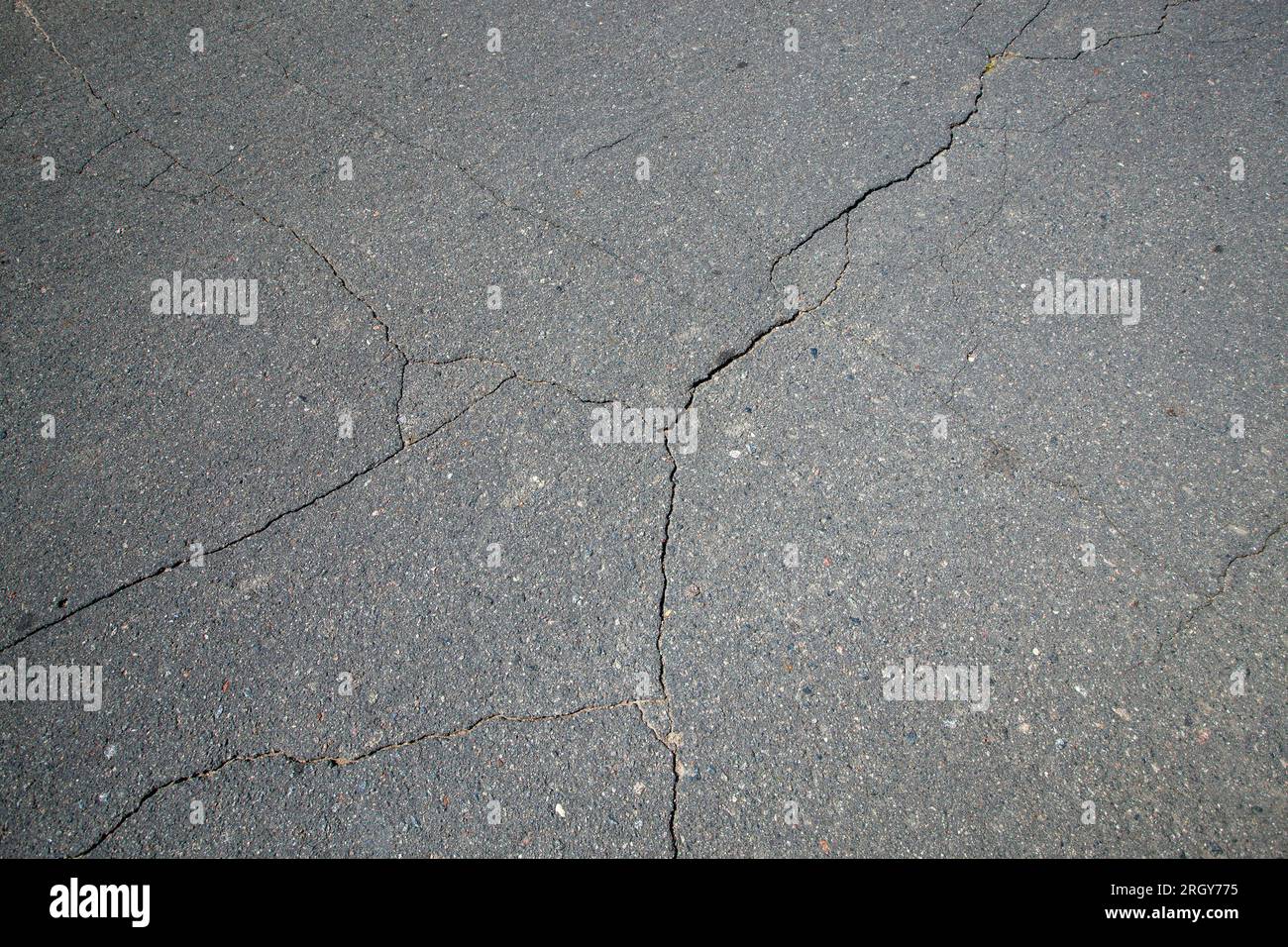 cracks on the paved highway, poor quality of the asphalt pavement of ...