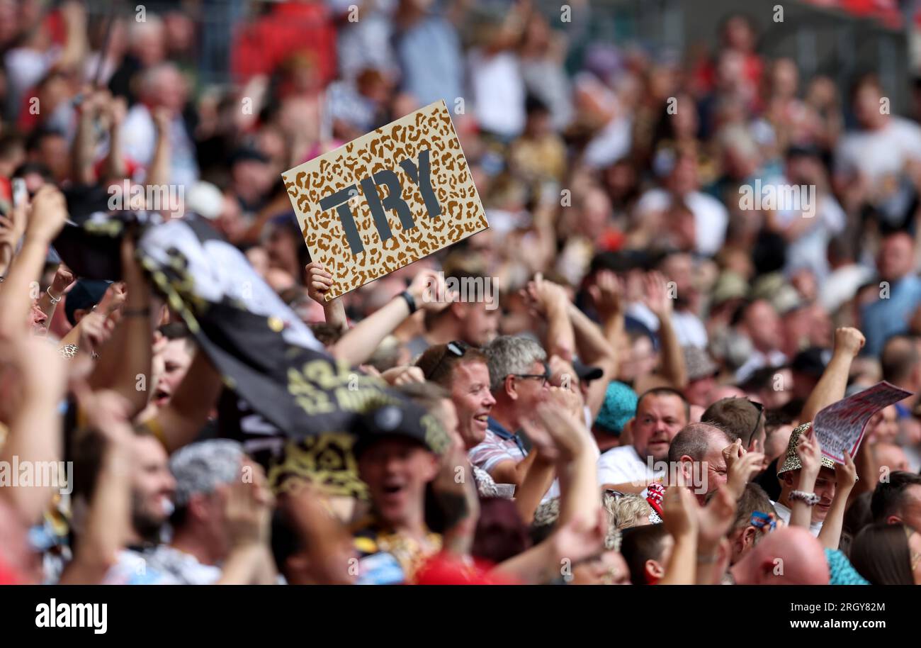 Leigh Leopards' fans in the stands celebrate their teams first try of ...