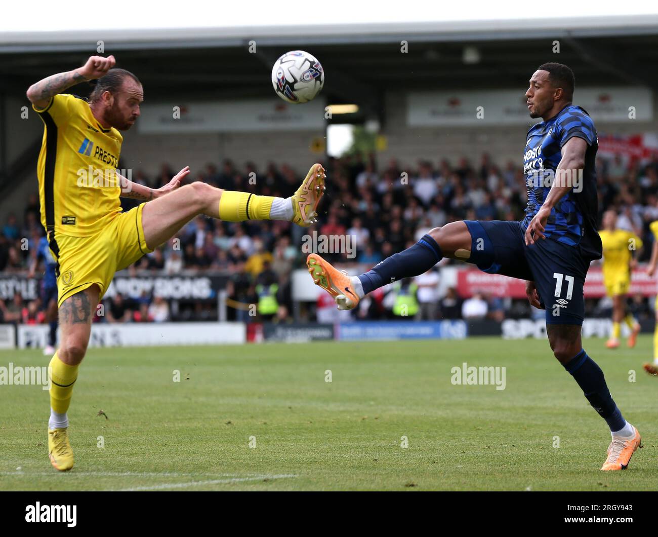 Burton Albion's John Brayford (left) and Derby County goalkeeper ...