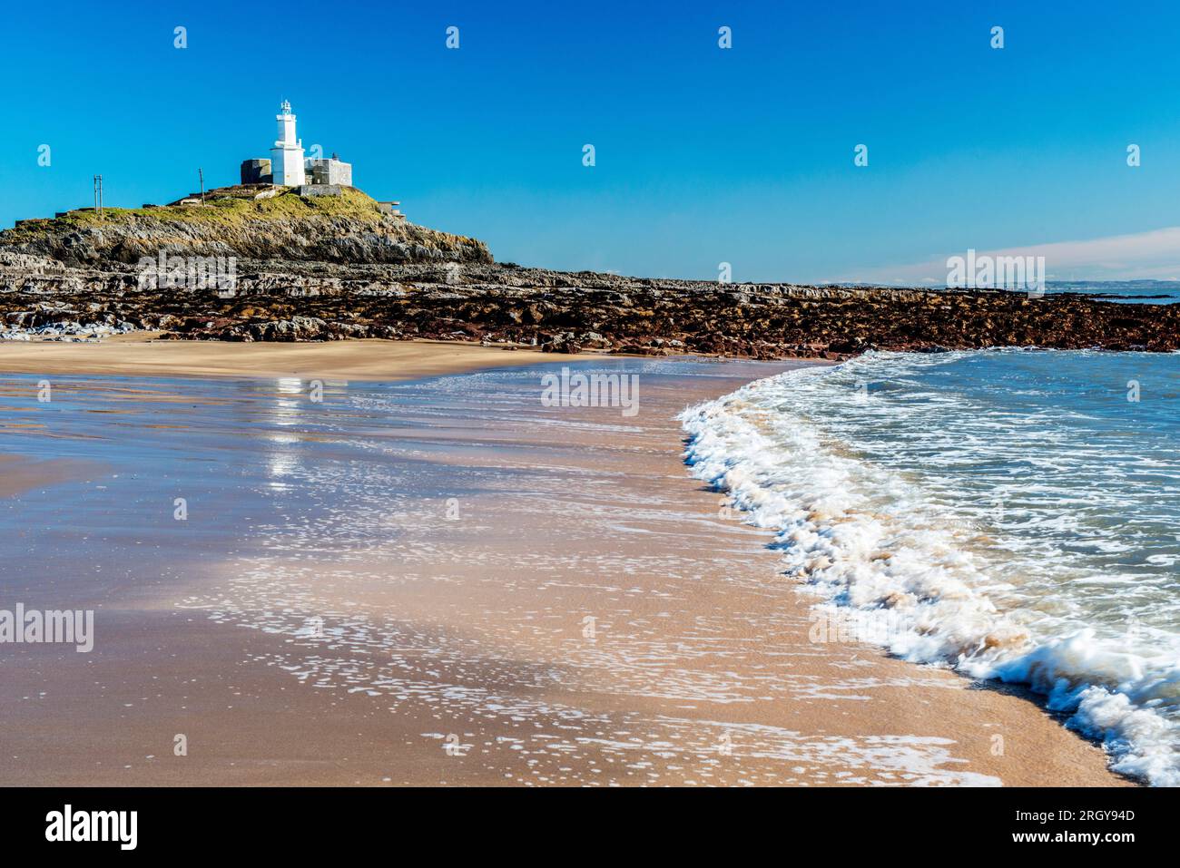 Lighthouse reflection on wet sand hi-res stock photography and images ...