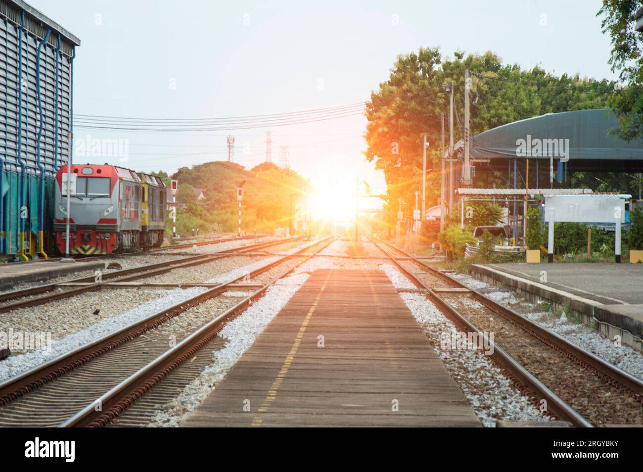 first sunlight at the train station Stock Photo - Alamy