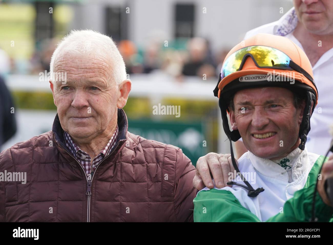 Jockey Seamus Heffernan and trainer Gerard Keane in the parade ring ...