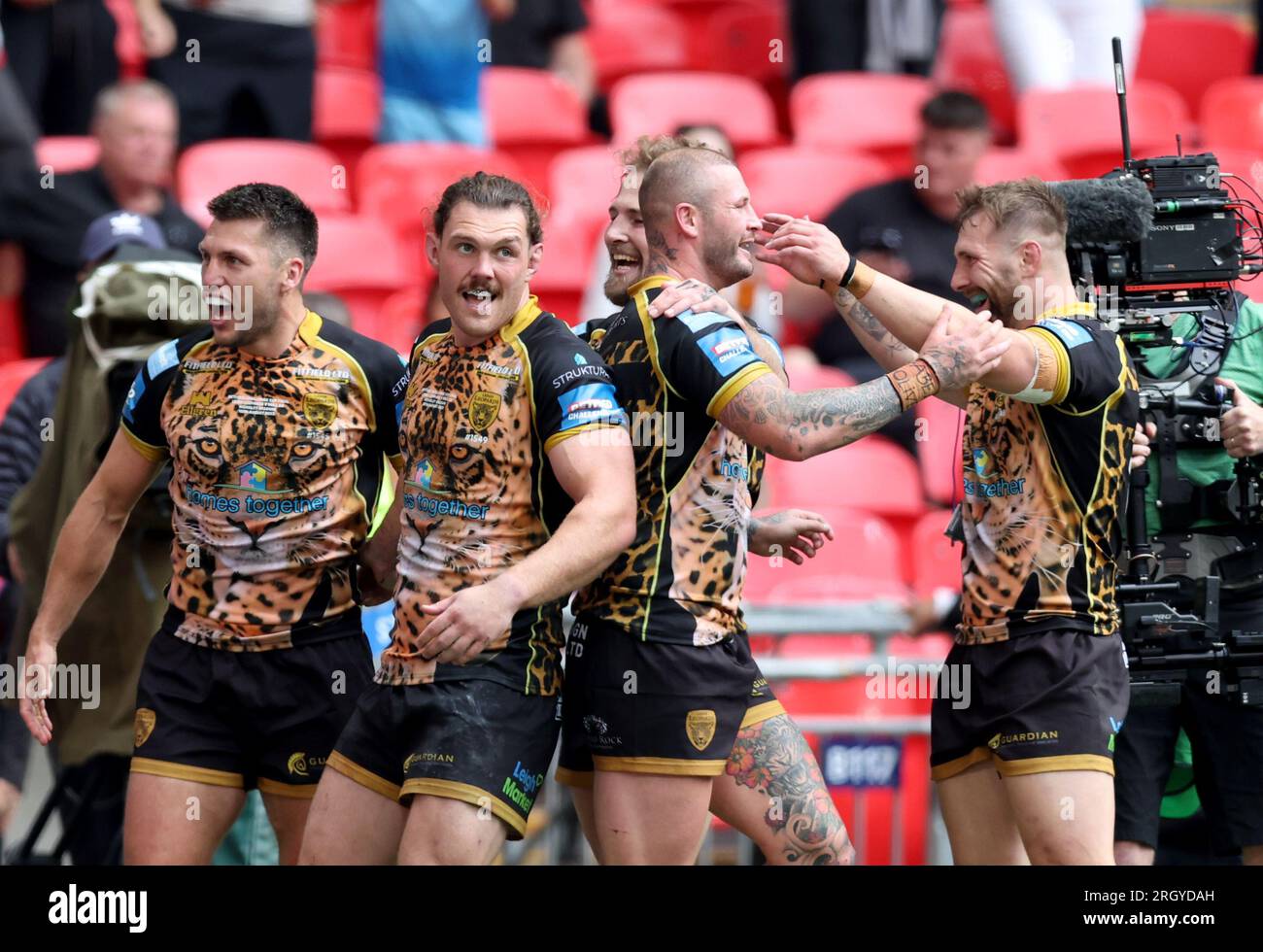 Leigh Leopards' Tom Briscoe (left) celebrates his try during the ...