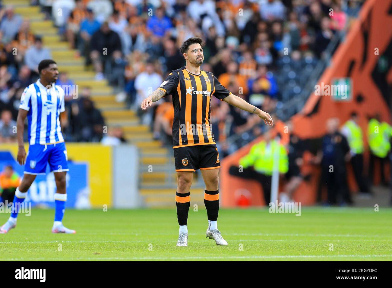 Hull, UK. 12th Aug, 2023. Hull City midfielder Ozan Tufan (7) scores a ...