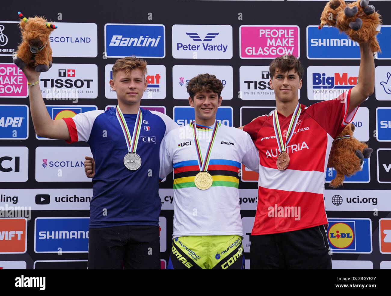 Spains Daniel Molto Cegarra with his gold medal alongside Frances Luka ...