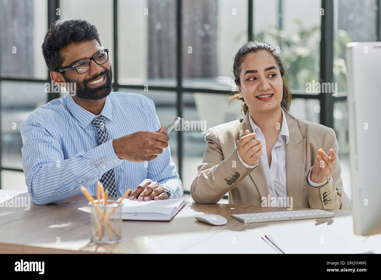 Smart business people working together with laptop while talking in the ...