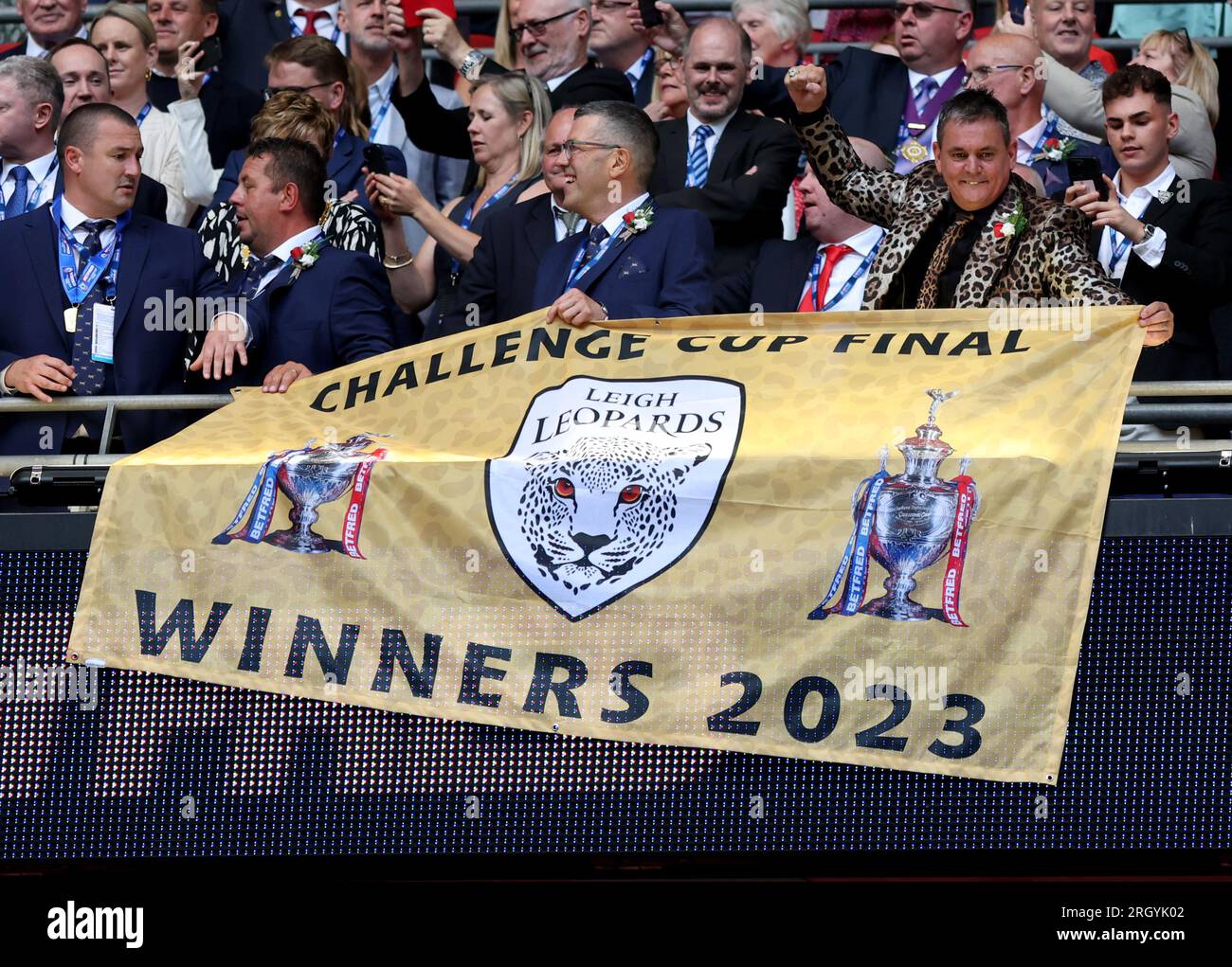 Leigh Leopards owner Derek Beaumont (right) celebrates after his team ...