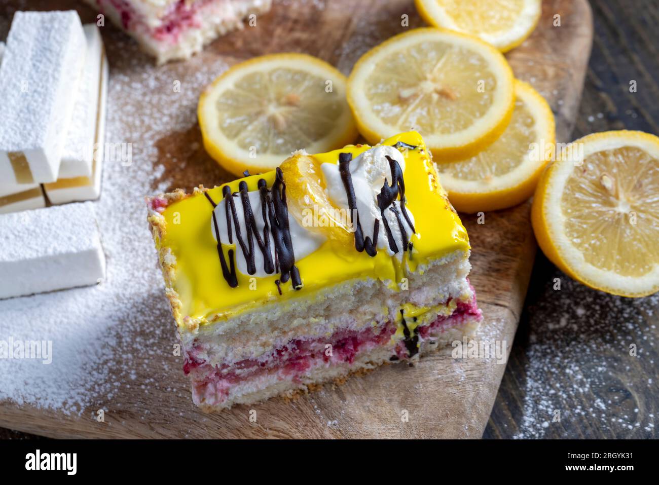 lemon strawberry cake made of several layers of cakes of different ...