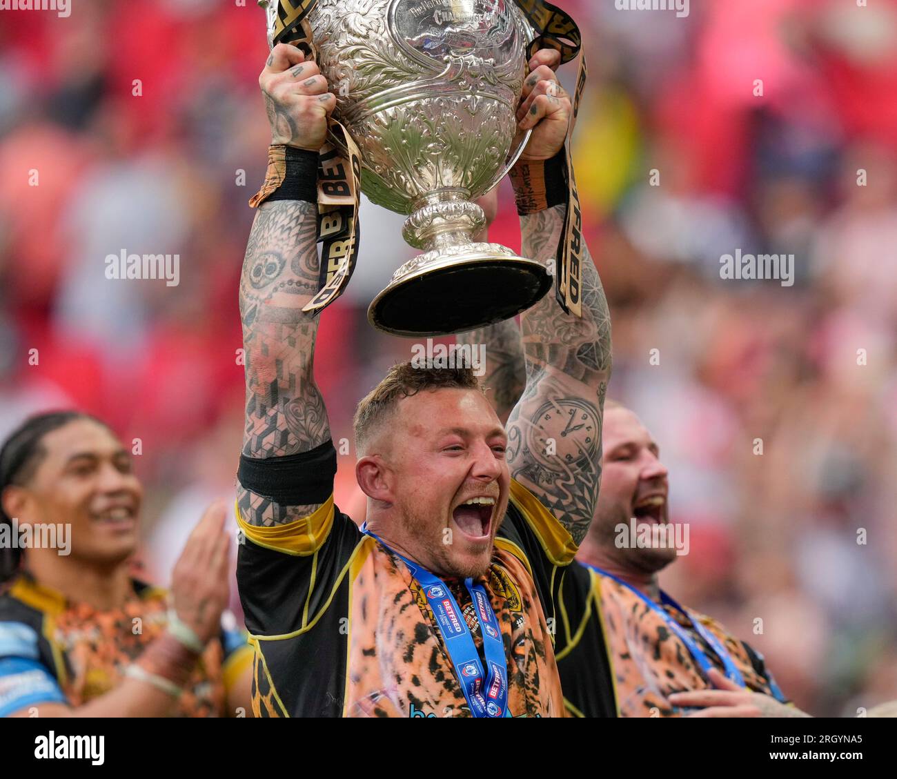 Josh Charnley #5 of Leigh Leopards lifts the BetFred Challenge Cup ...