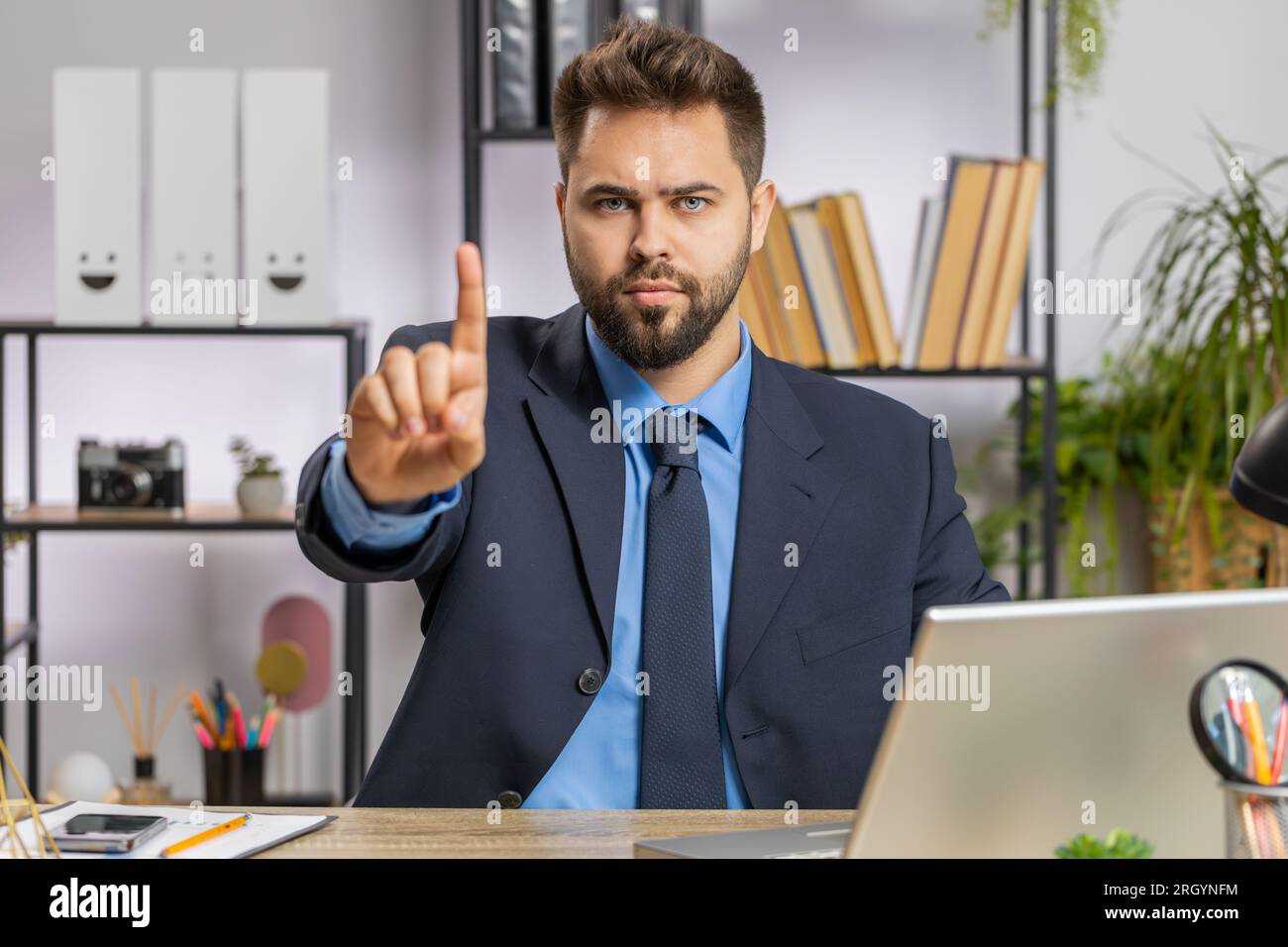 Angry businessman saying stop hi-res stock photography and images - Alamy