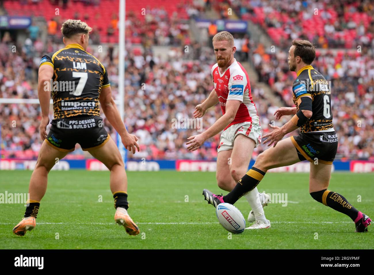 Rowan Milnes #21 of Hull KR chips the ball through during the Betfred ...