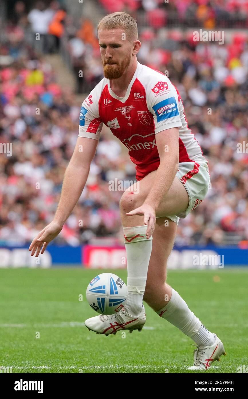 Rowan Milnes #21 of Hull KR chips the ball through during the Betfred ...