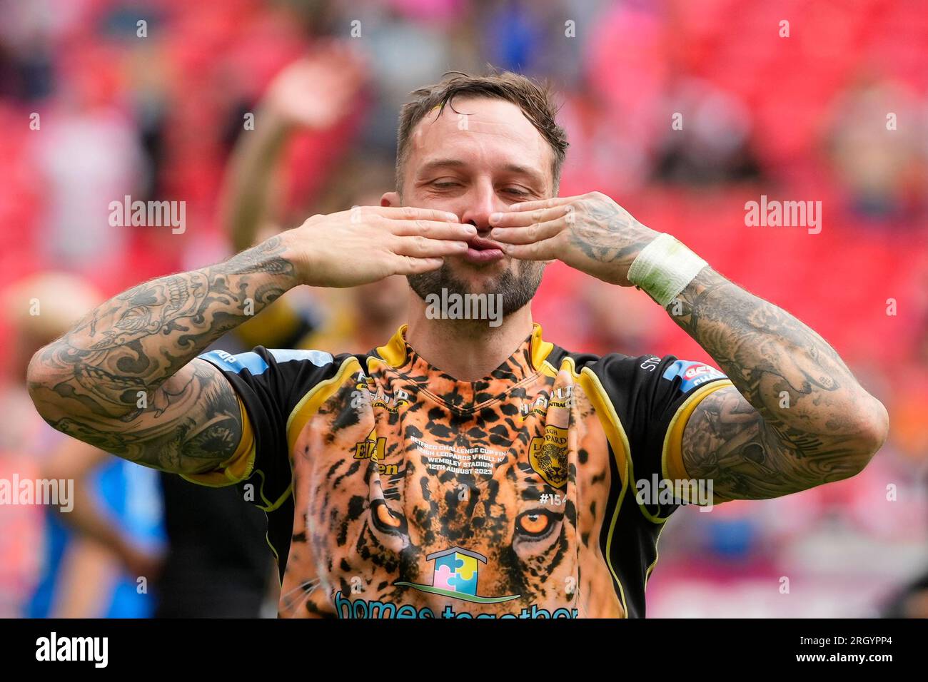 Joe Mellor #6 of Leigh Leopards celebrates with the fans during the ...