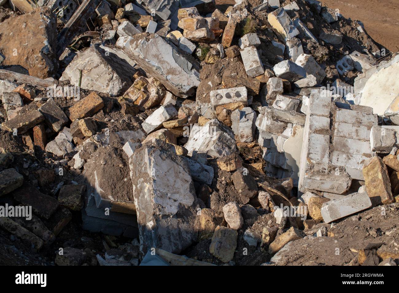 bricks and other building materials scattered on the territory after ...