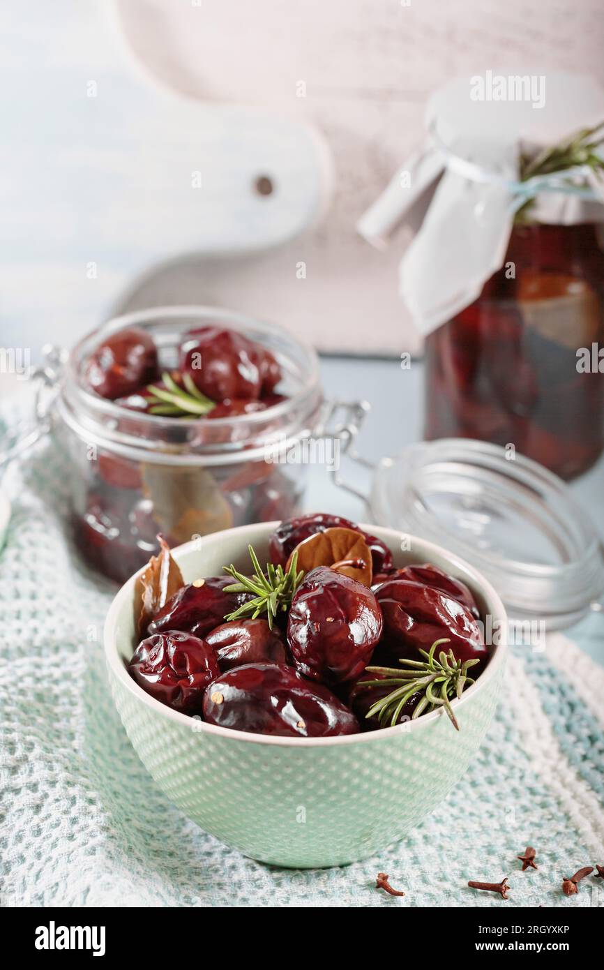 Preserving pickled plums and seasonings Stock Photo - Alamy