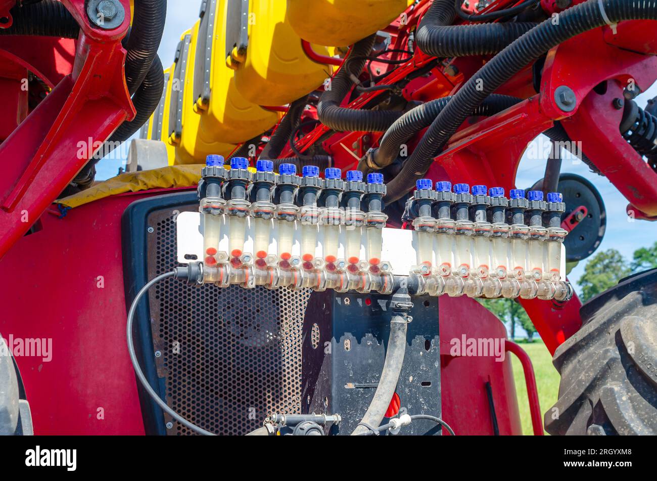 Parts of tractor seeder mechanisms. Close-up of details of agricultural ...