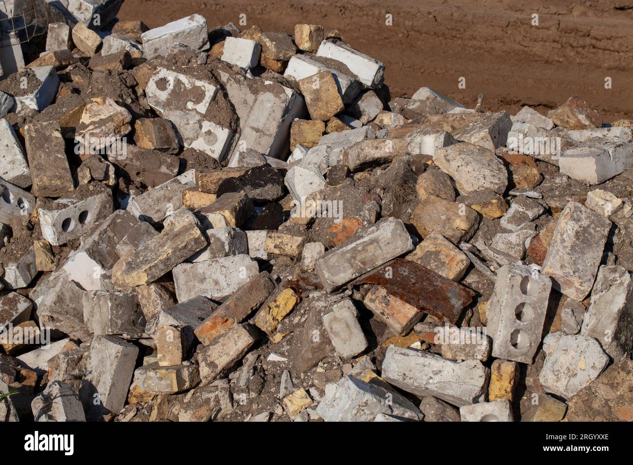 bricks and other building materials scattered on the territory after ...