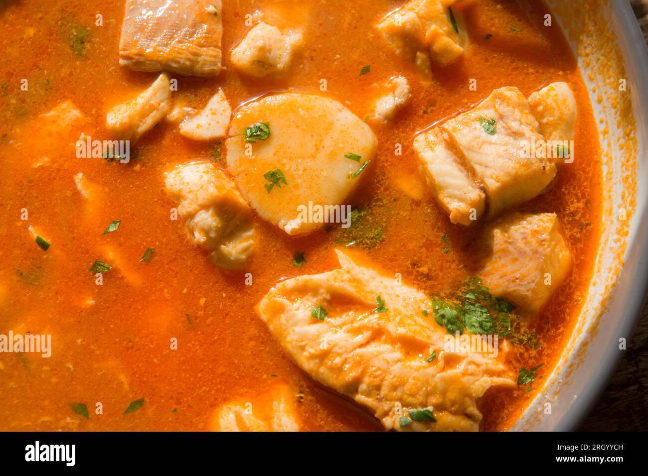 A bowl of fish stew or bouillabaisse, that has been made with king ...
