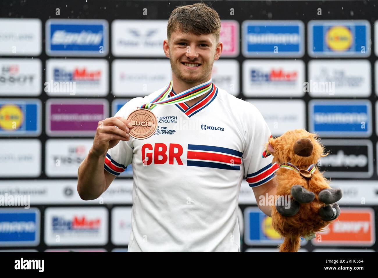 Great Britain's Charlie Rolls celebrates with the bronze medal for the ...