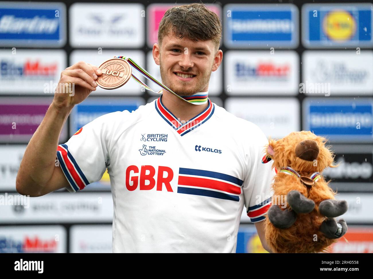 Great Britain's Charlie Rolls celebrates with the bronze medal for the ...