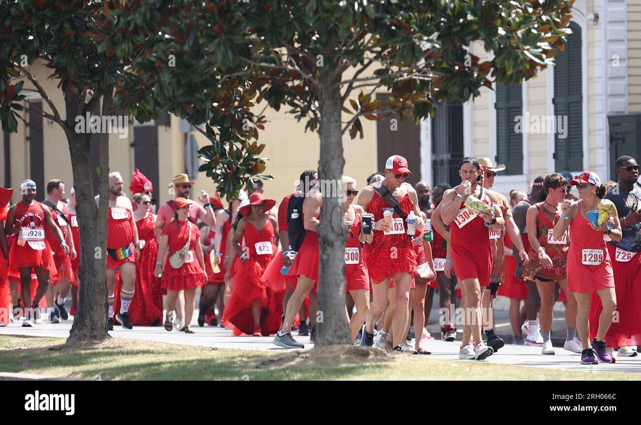 New Orleans, USA. 12th Aug, 2023. Participants of the Red Dress Run ...