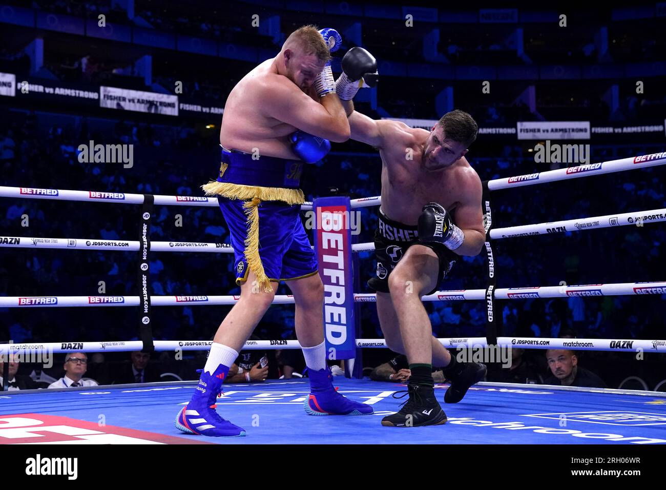 Johnny Fisher (right) in action against Harry Armstrong in the vacant ...