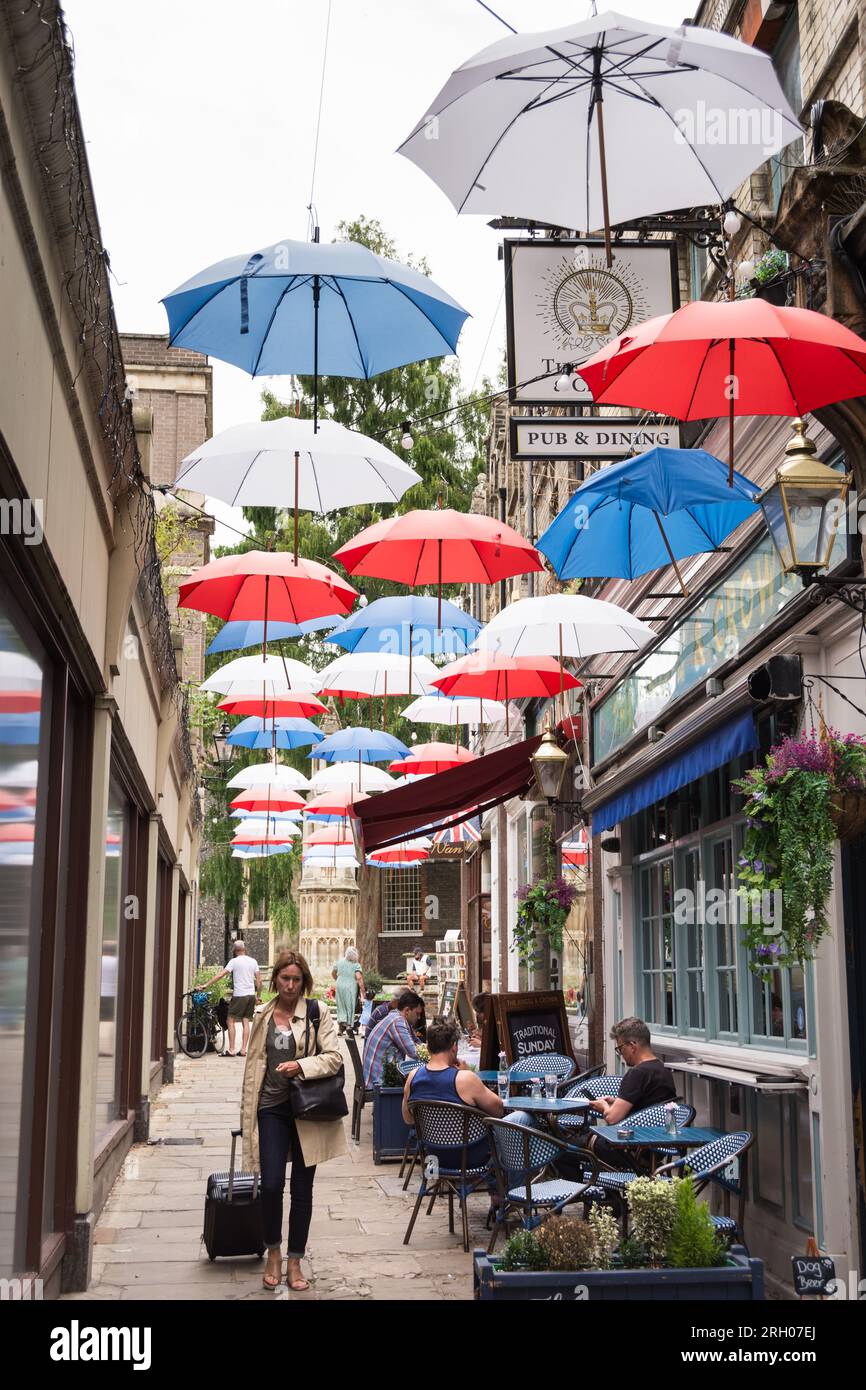 Businesswoman pulling red trolley hi-res stock photography and images ...