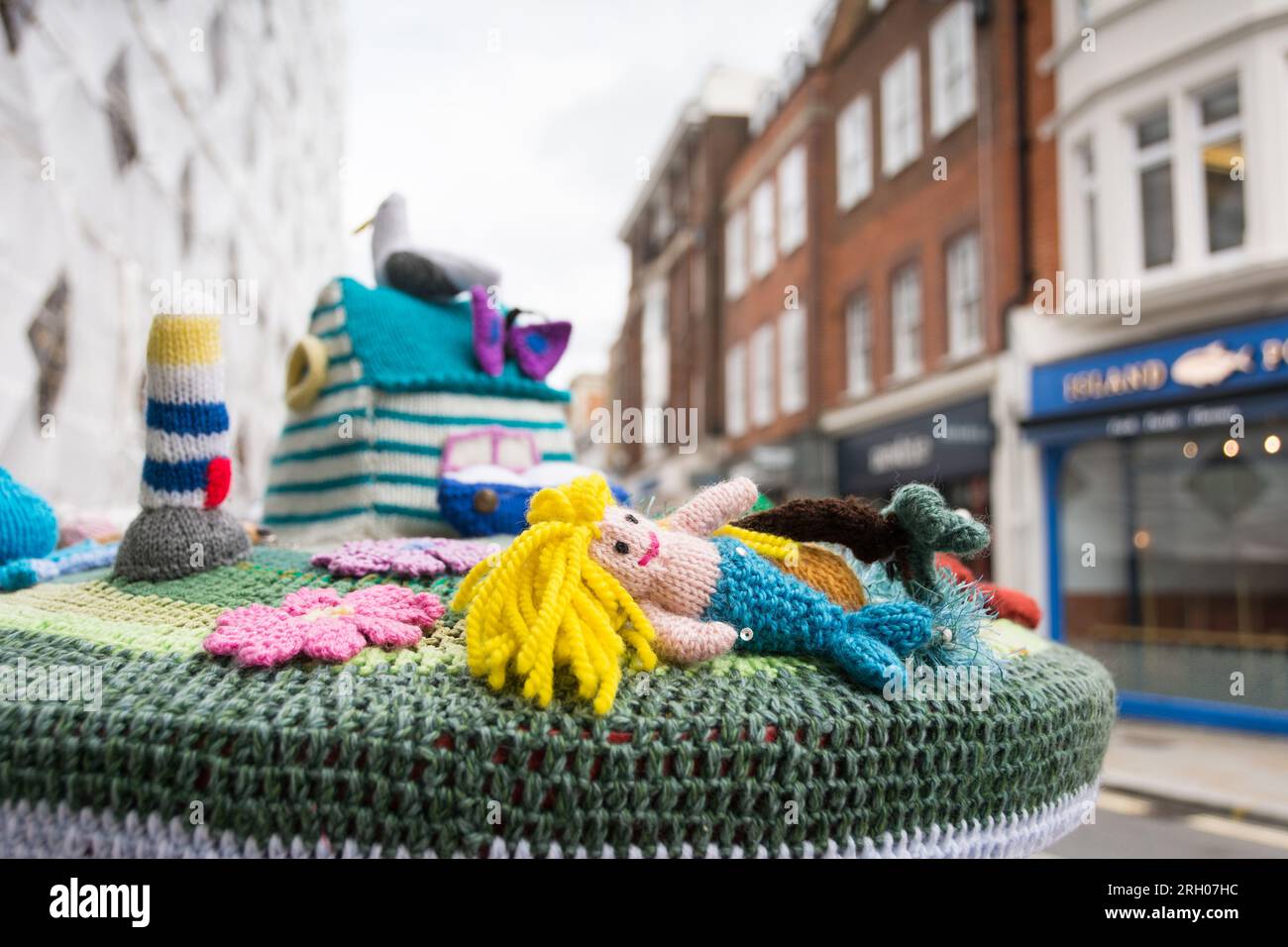 A colourful post box topper on George Street, Richmond, TW9, Surrey ...