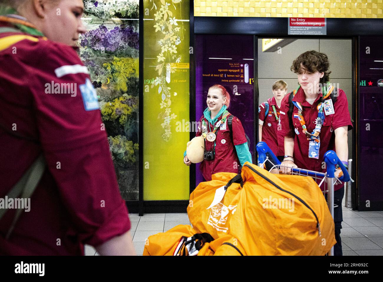 SCHIPHOL - Dutch scouts arrive at Schiphol. The scouts attended the ...