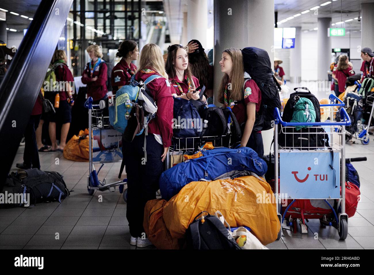 SCHIPHOL - Dutch scouts arrive at Schiphol. The scouts attended the ...