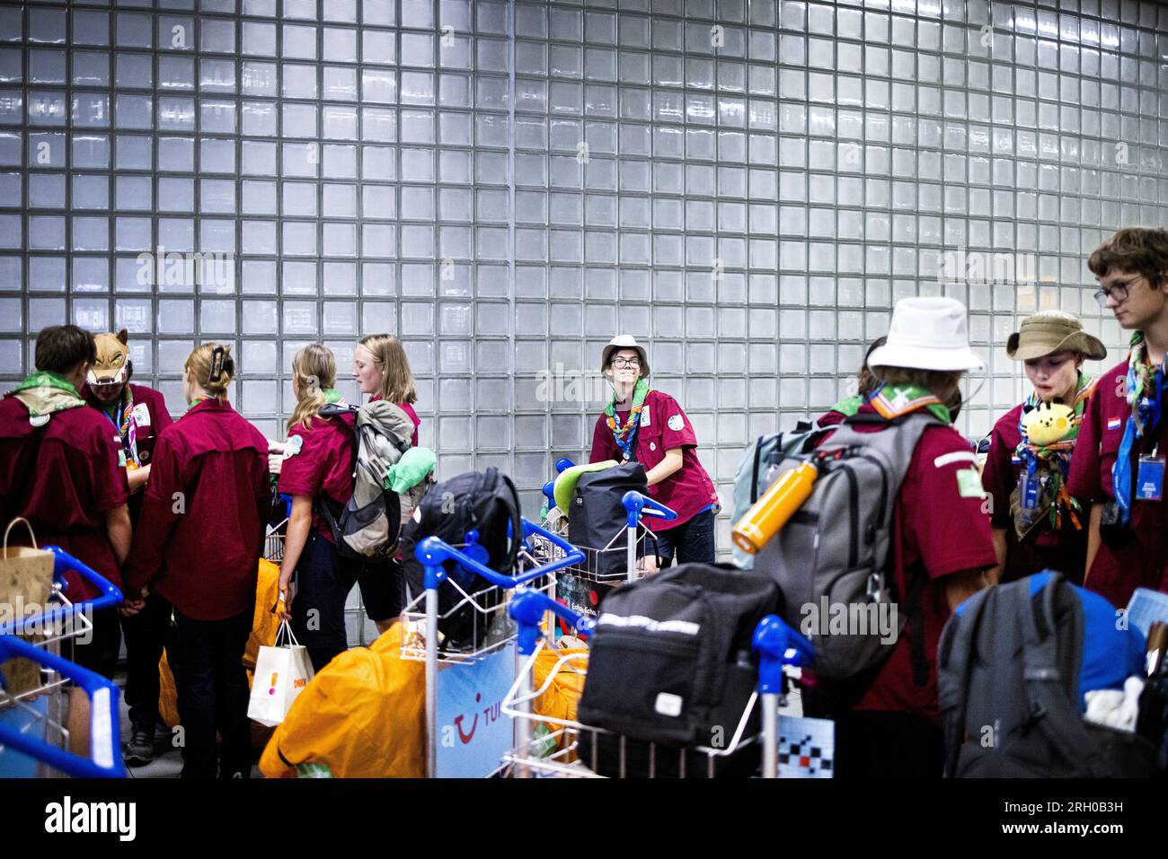 SCHIPHOL - Dutch scouts arrive at Schiphol. The scouts attended the ...