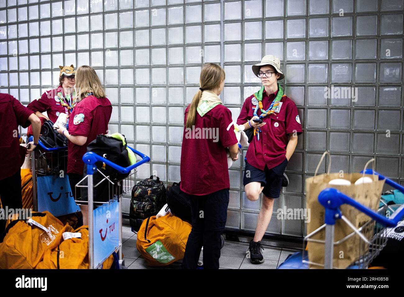 SCHIPHOL - Dutch scouts arrive at Schiphol. The scouts attended the ...