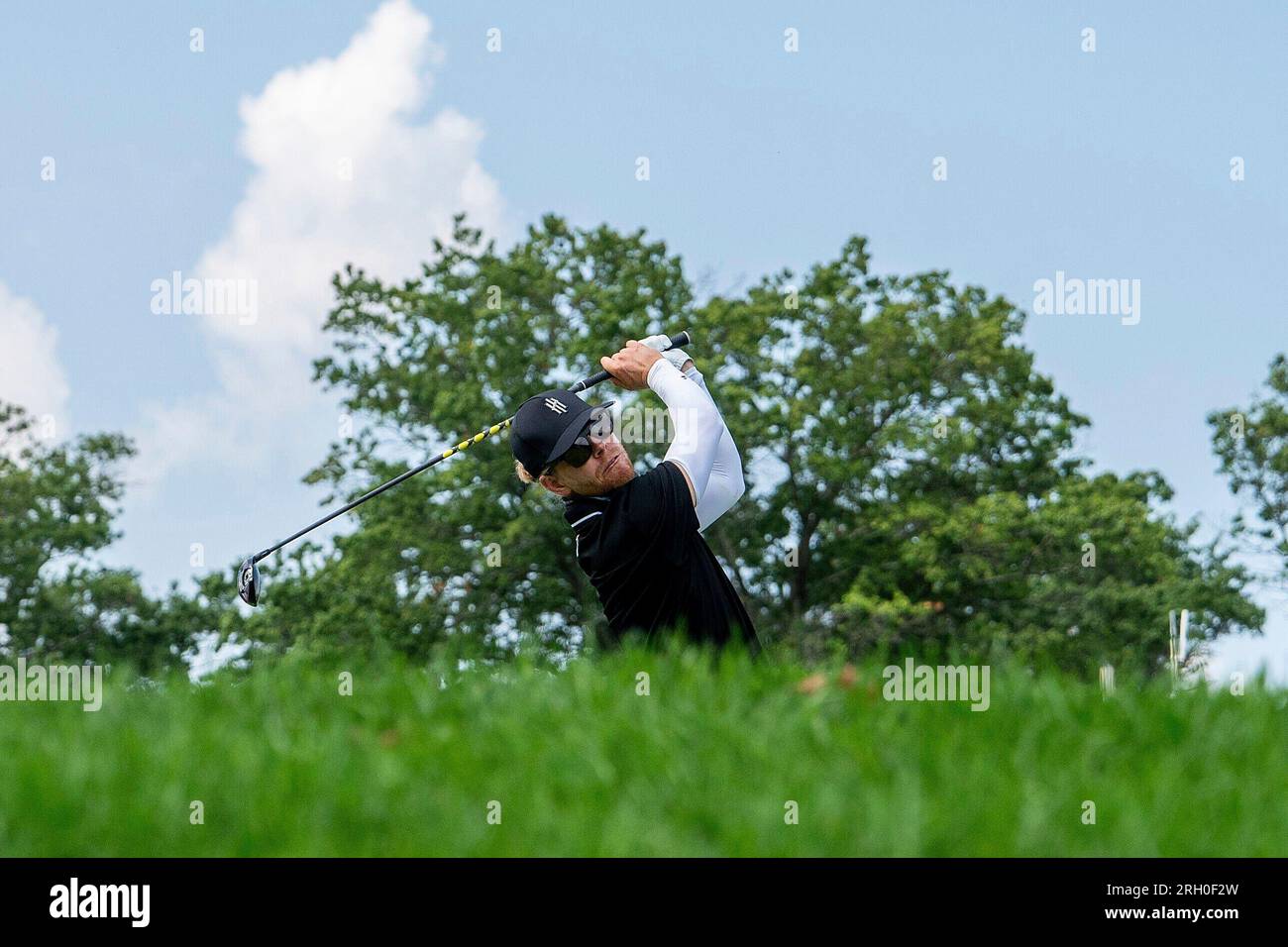 Scott Vincent of Iron Heads GC hits his shot from the 13th tee during ...