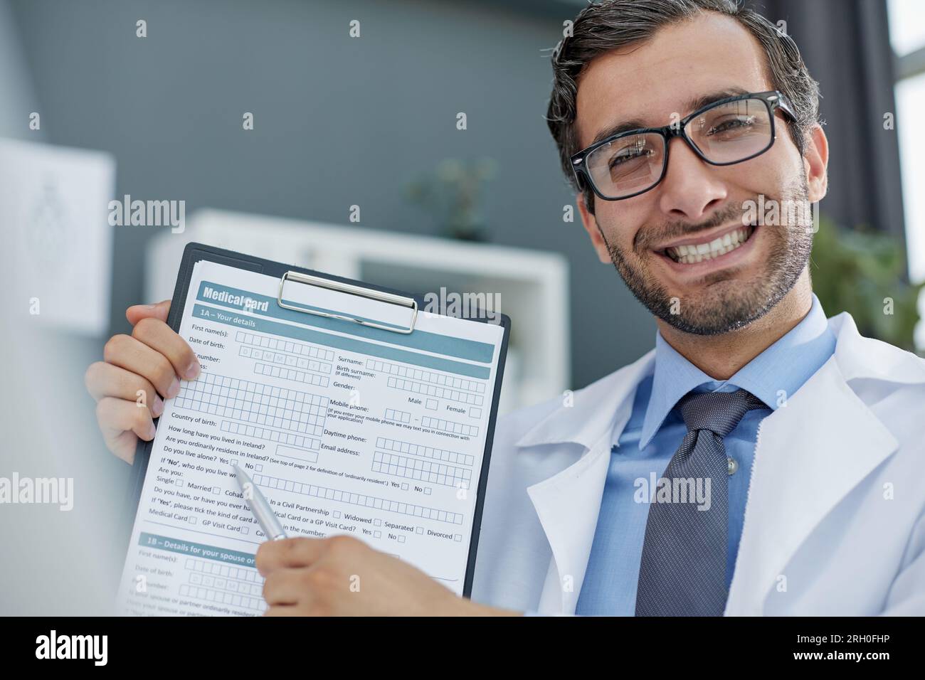 Close up of a doctor and patient hands while phisician pointing into ...