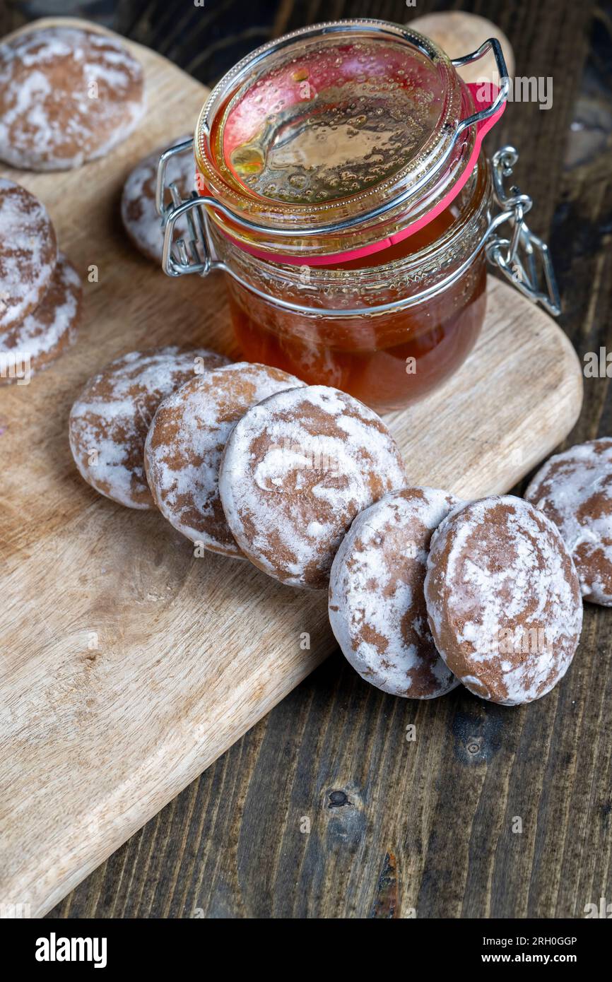 iced sugar gingerbread on a cutting board, flour pastry made of ...